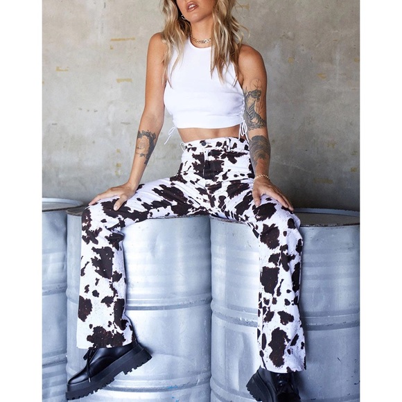 Motel Rocks | Pants & Jumpsuits | Motel Cow Print Zoven Flares | Poshmark